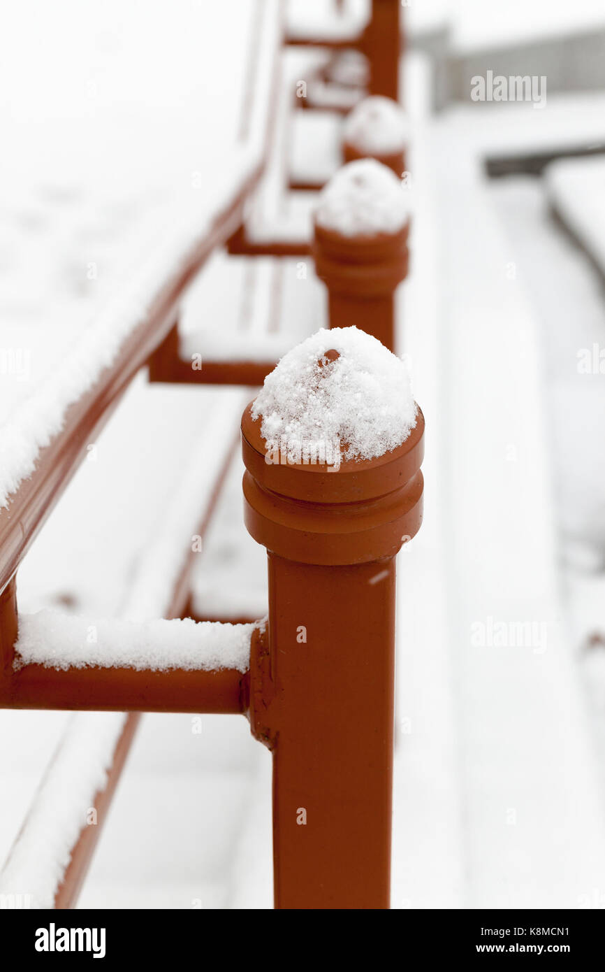 photographed close-up metal railing near the steps. Winter time of the ...