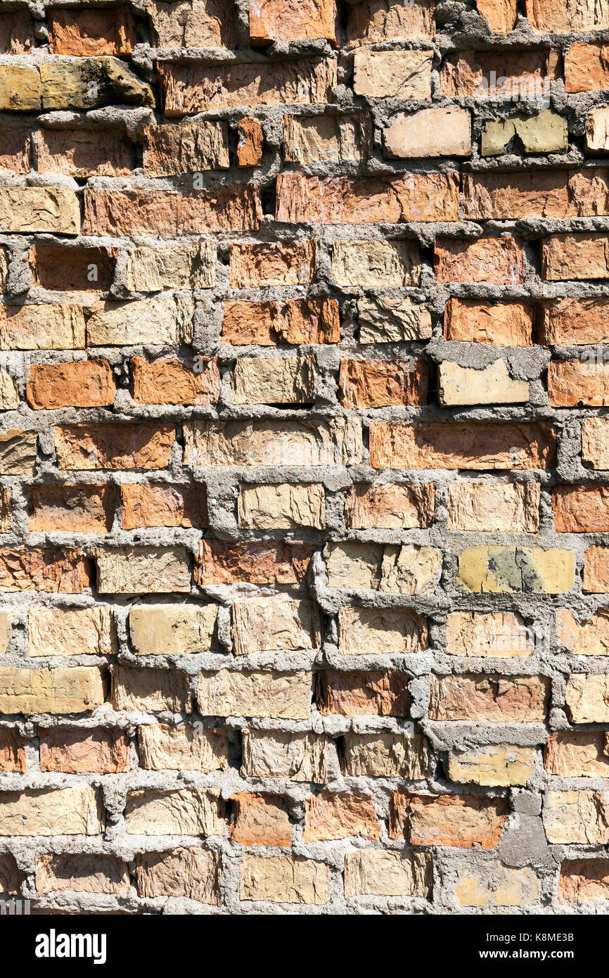 close-up photographed part of the wall of the building that began to ...