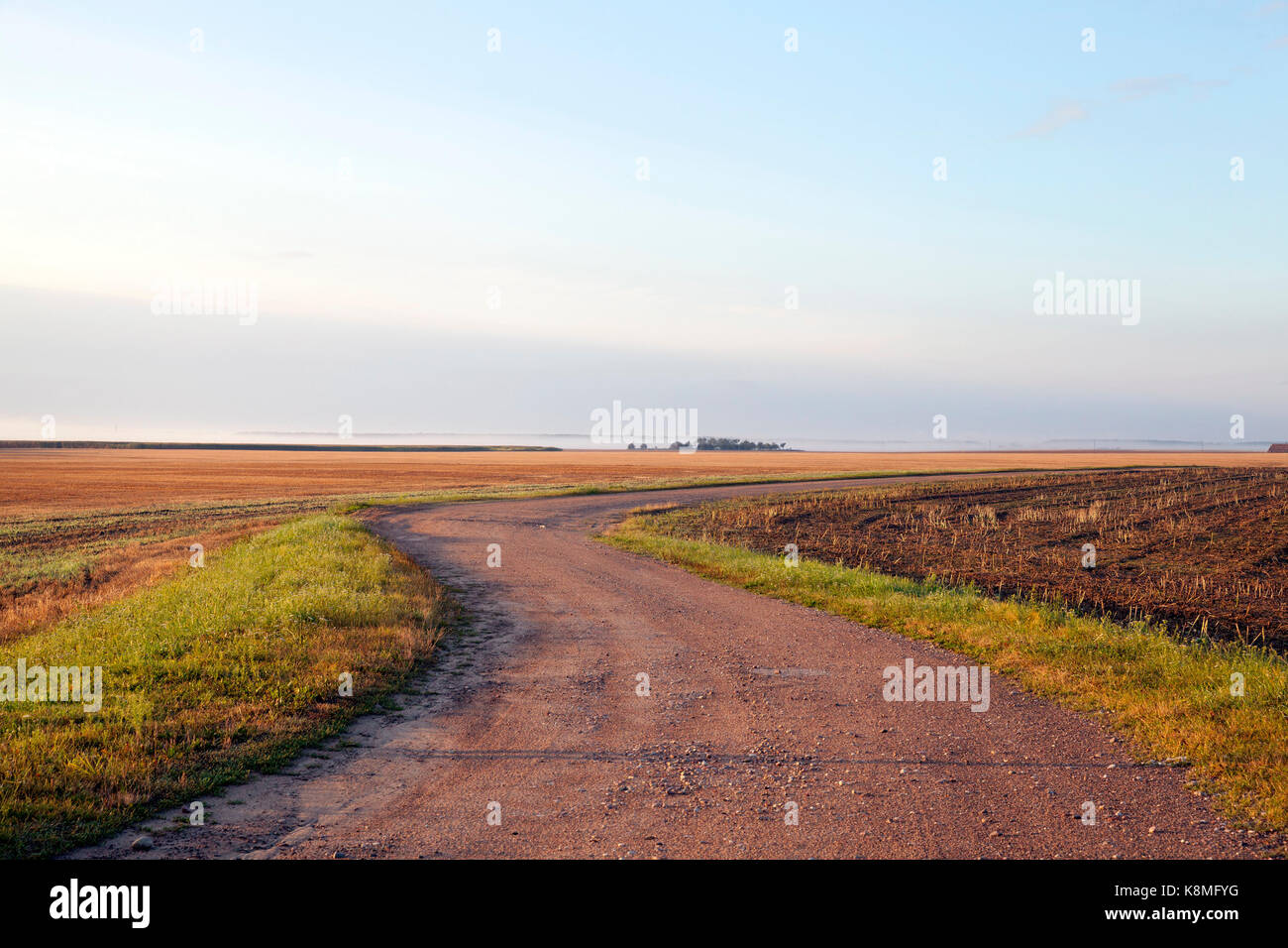a country road without asphalt with a number of turns. The photo was ...