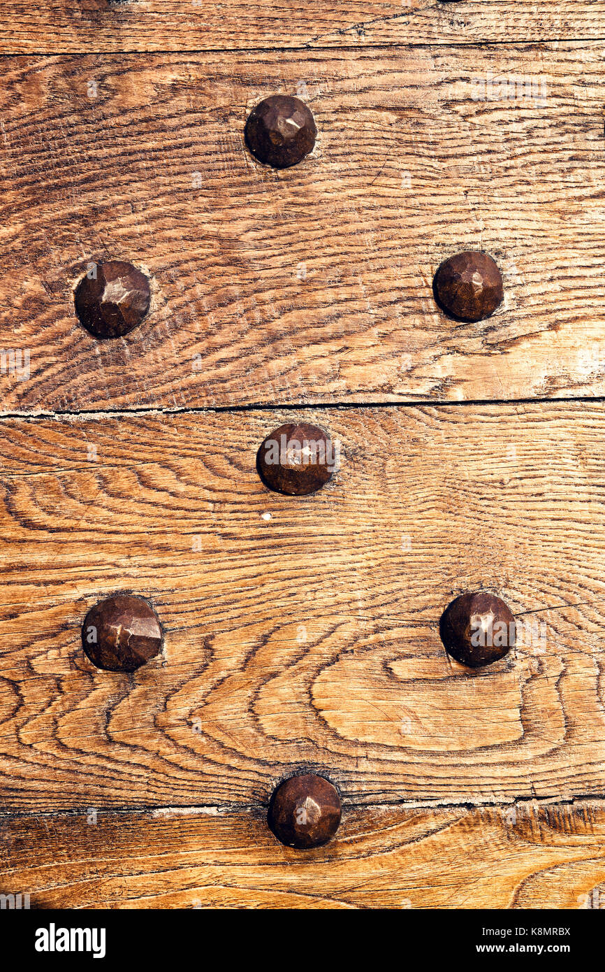 old wooden surface with grains and rusty iron rivets Stock Photo - Alamy