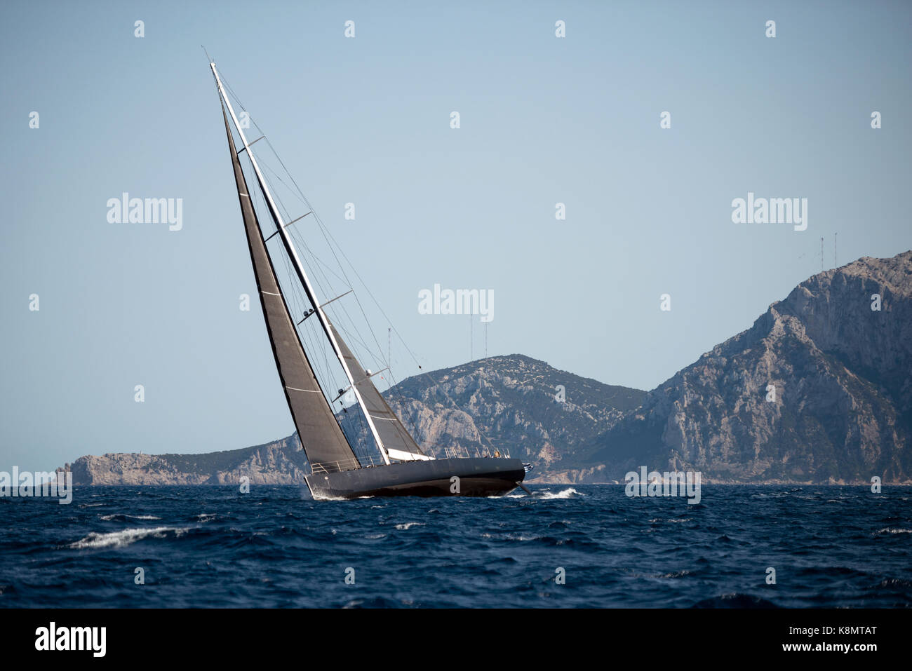 Black sailing yacht on the sea Stock Photo - Alamy