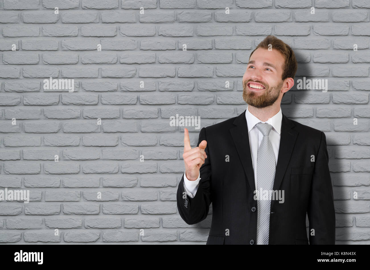 Finger pointing up man hi-res stock photography and images - Alamy