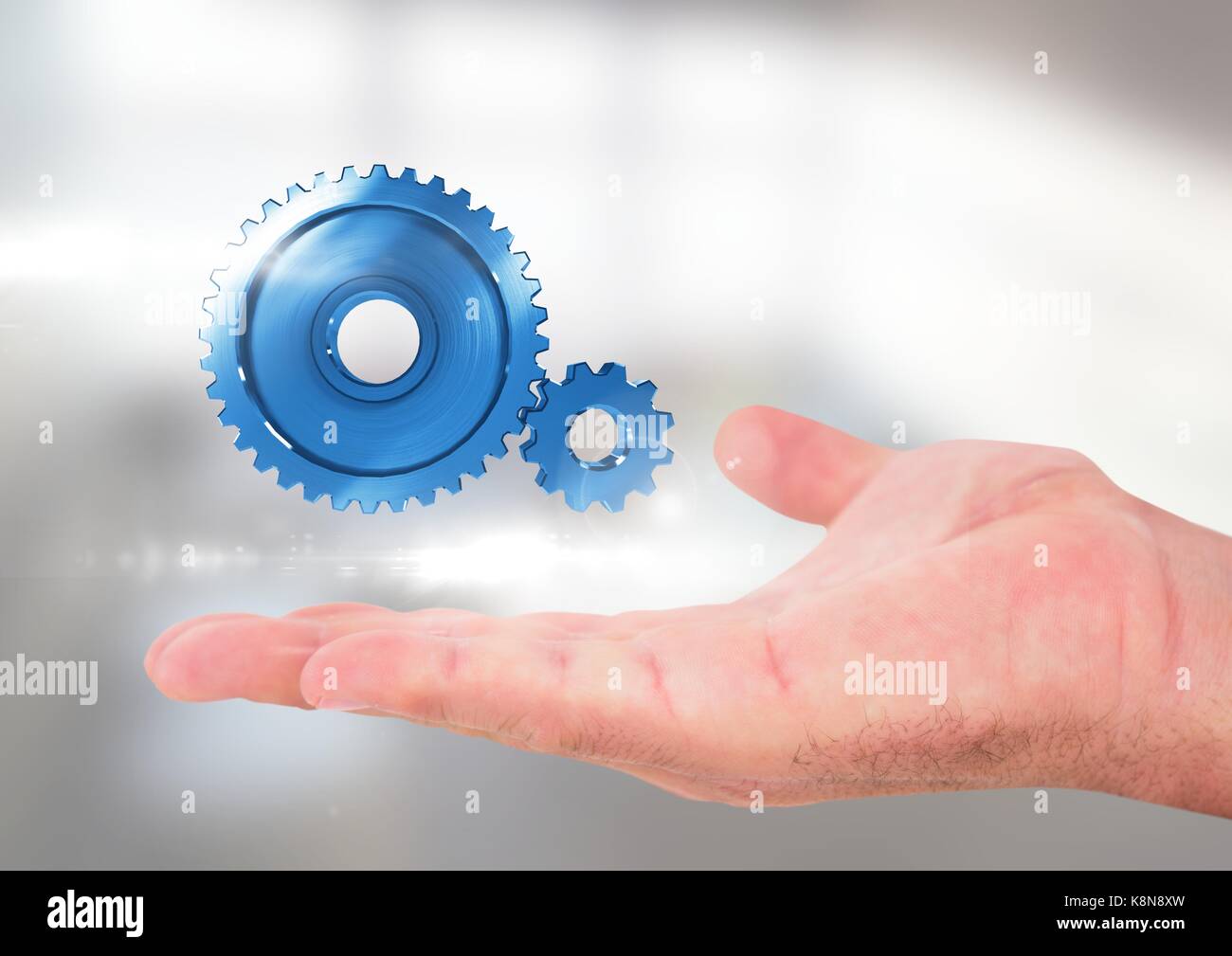Digital composite of Open hand with cog gears Stock Photo - Alamy