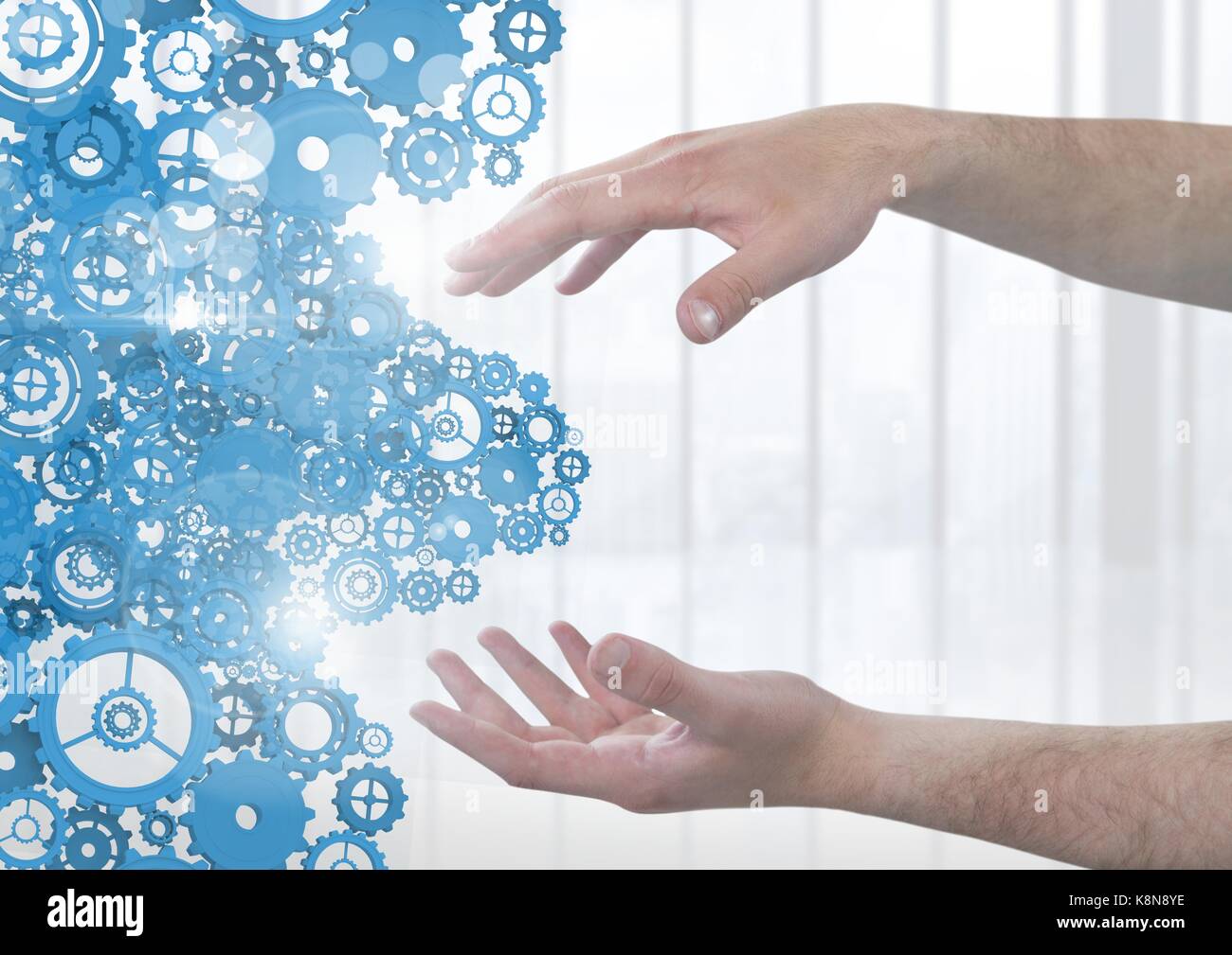 Digital composite of Open hands with cog gears Stock Photo - Alamy