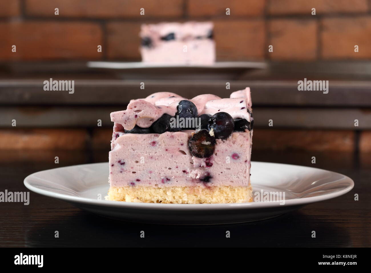 Cold cheesecake with blueberry and strawberry Stock Photo - Alamy