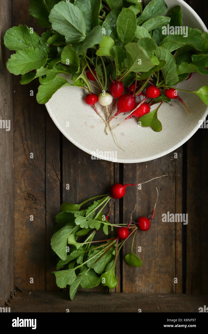 Fresh red radish in crate, food top view Stock Photo - Alamy