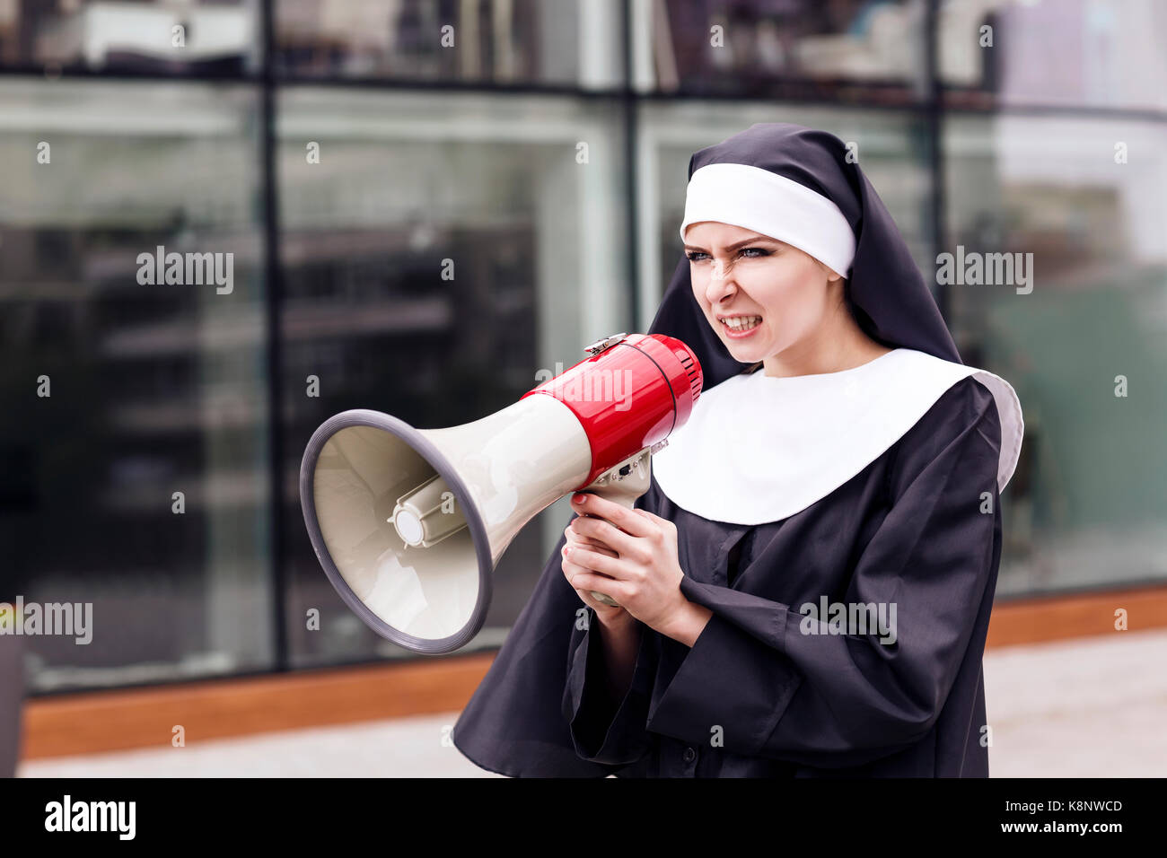 Angry nun hi-res stock photography and images - Alamy