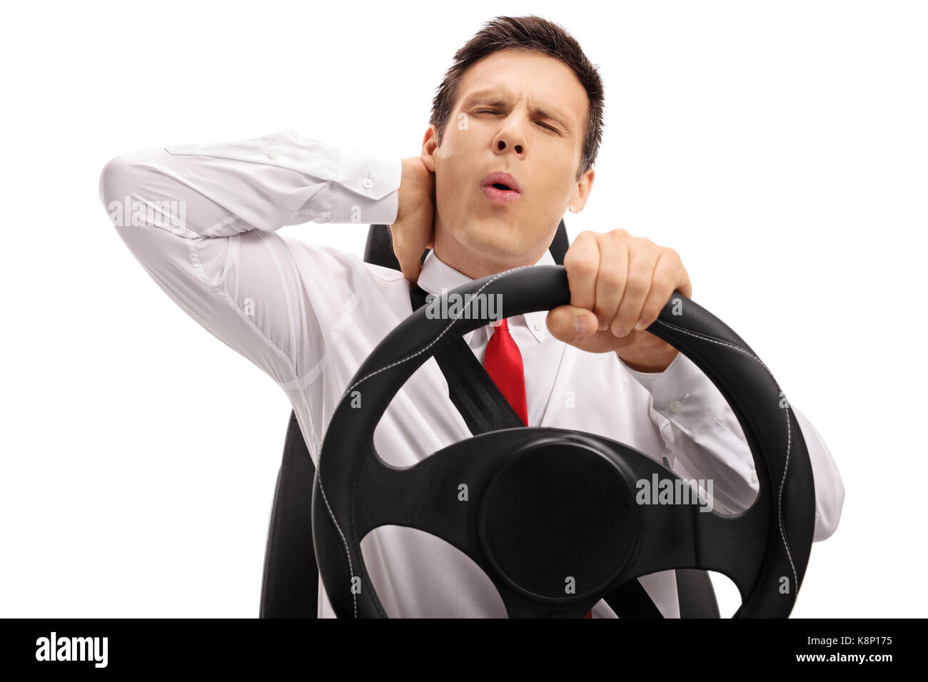 Businessman driving and experiencing neck pain isolated on white ...
