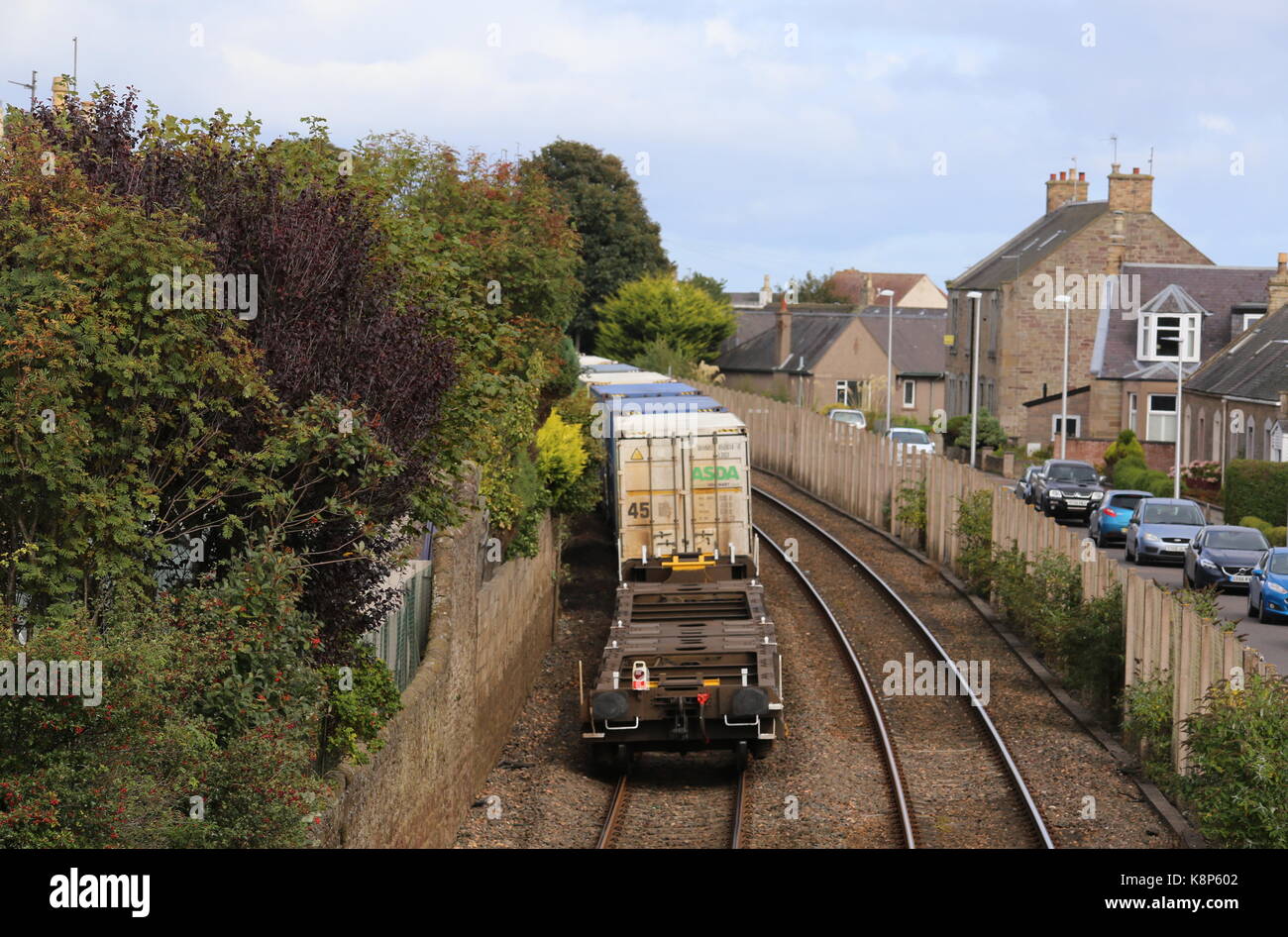 Elevated view of freight train passing Carnoustie Angus Scotland ...