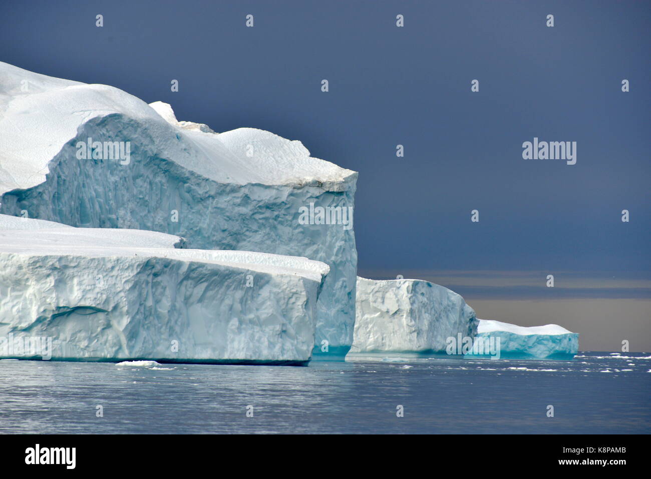 Icebergs floating in the fjord near Ilulissat on the west coast of ...