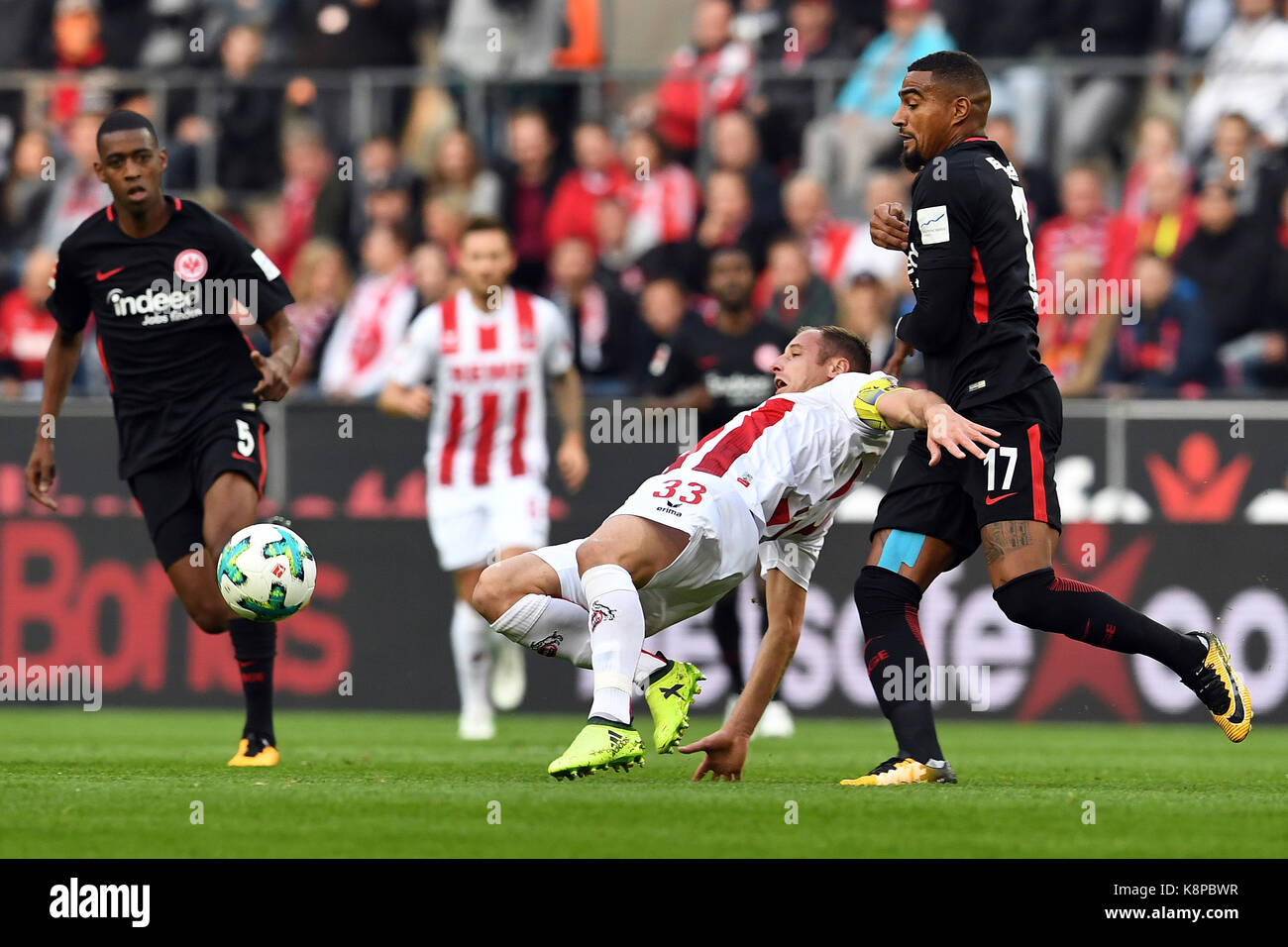 Cologne, Germany. 20th Sep, 2017. Cologne's Matthias Lehmann (C) and ...