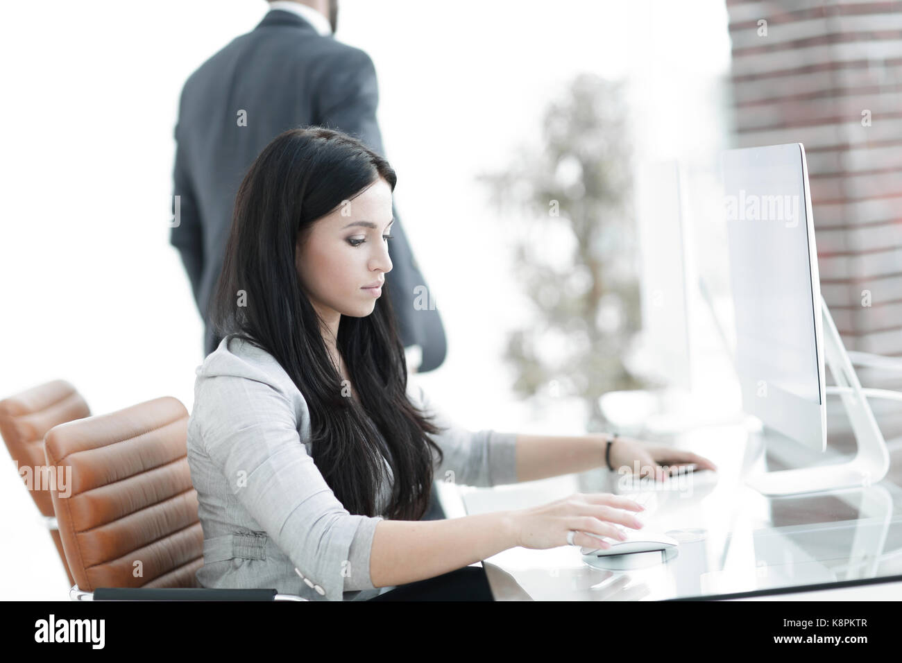 attentive business woman working with documents Stock Photo - Alamy