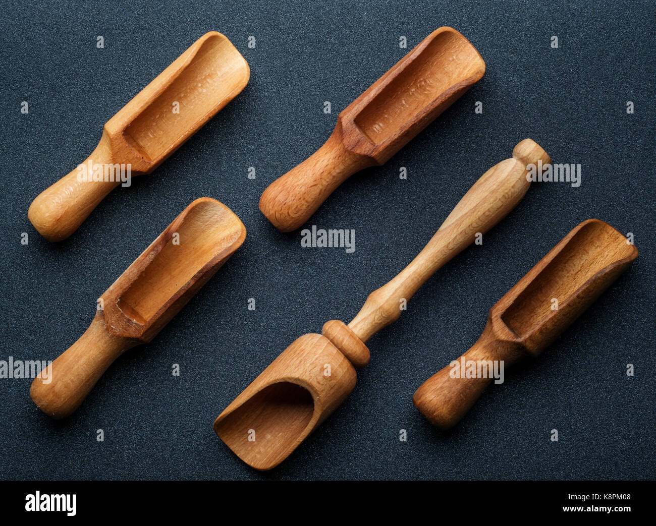 Set of Wooden spoon on dark wooden background Stock Photo - Alamy