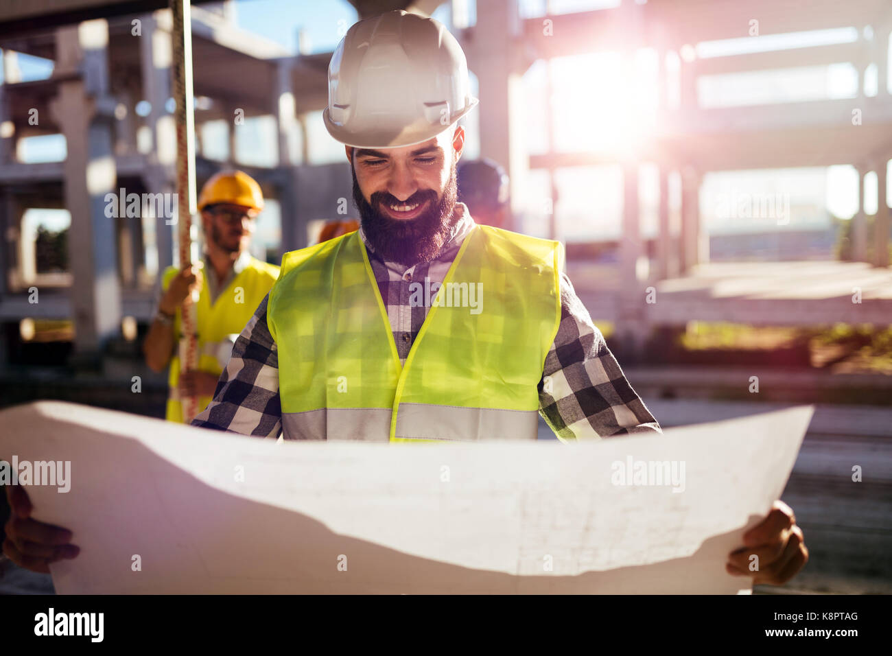 Picture of construction engineer working on building site Stock Photo ...