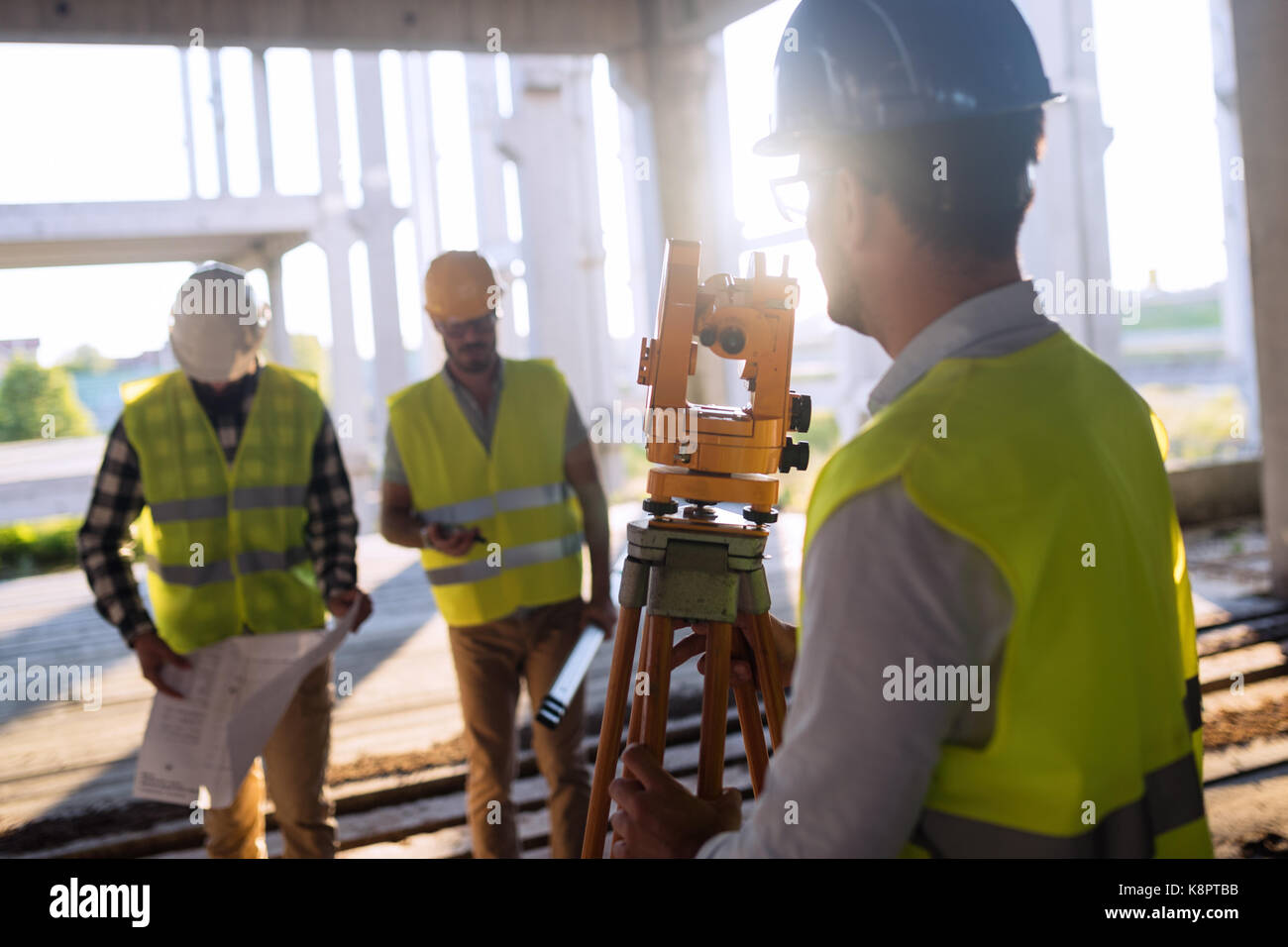 Portrait of construction engineers working on building site Stock Photo ...