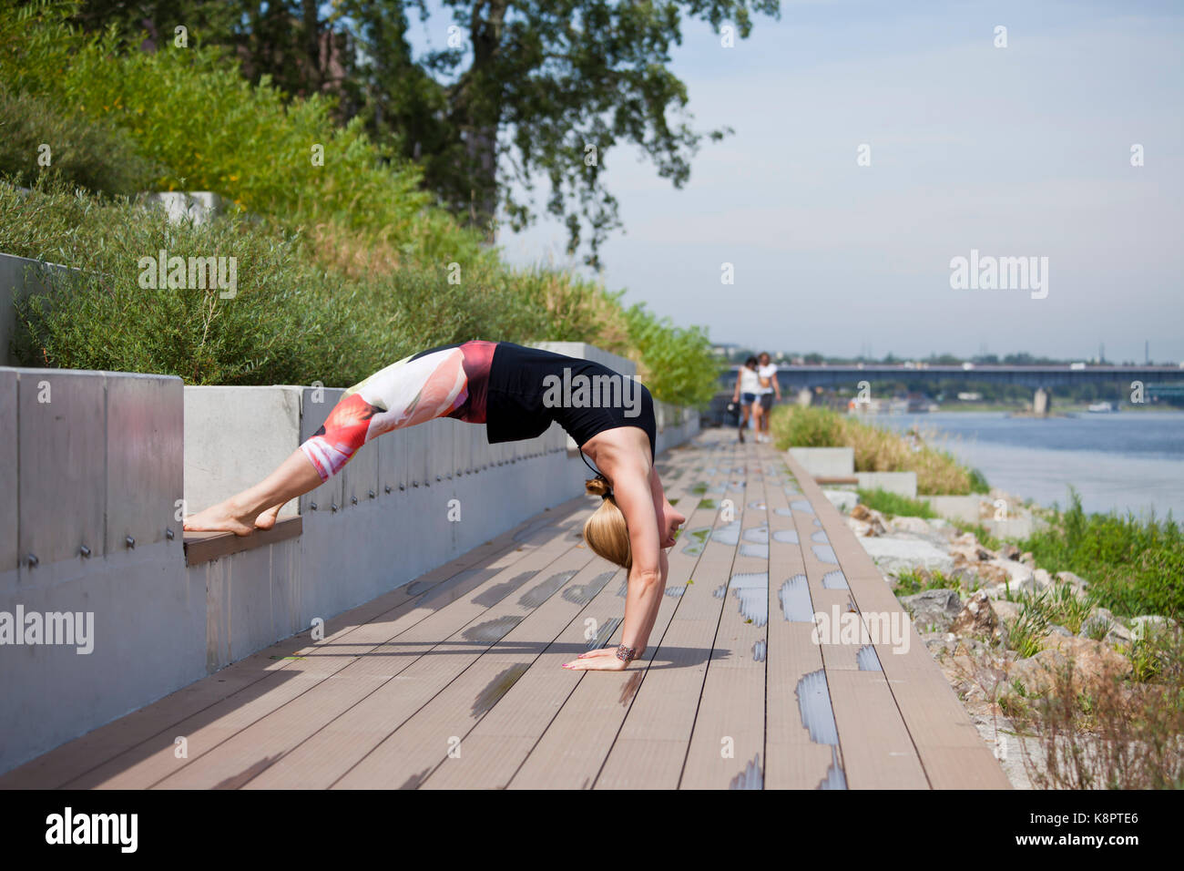 Woman doing outdoor workout in the city Stock Photo - Alamy