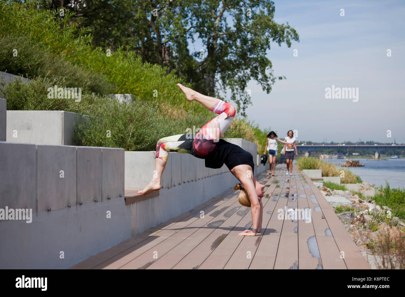 Woman doing outdoor workout in the city Stock Photo - Alamy