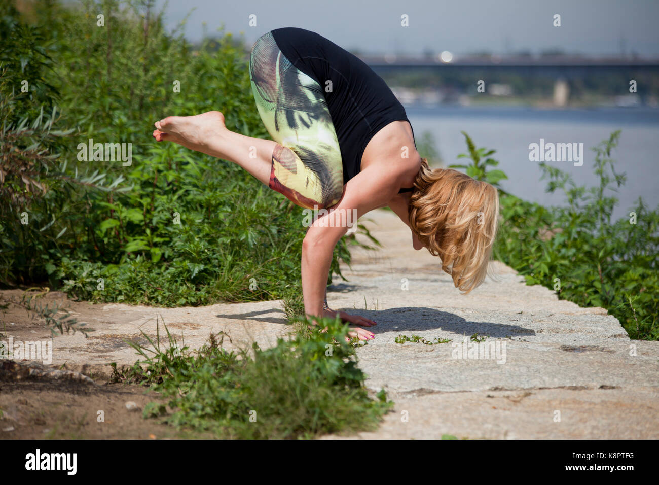 Woman doing outdoor workout in the city Stock Photo - Alamy