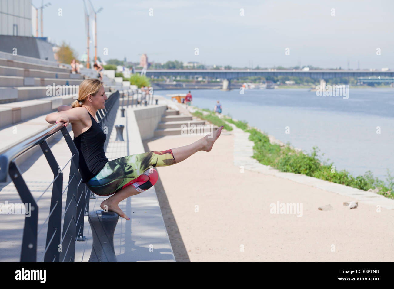 Woman doing outdoor workout in the city Stock Photo - Alamy