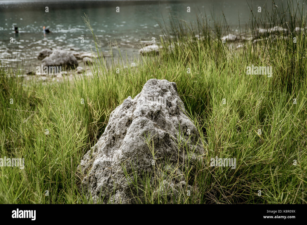 stone in the front of a lake Stock Photo - Alamy