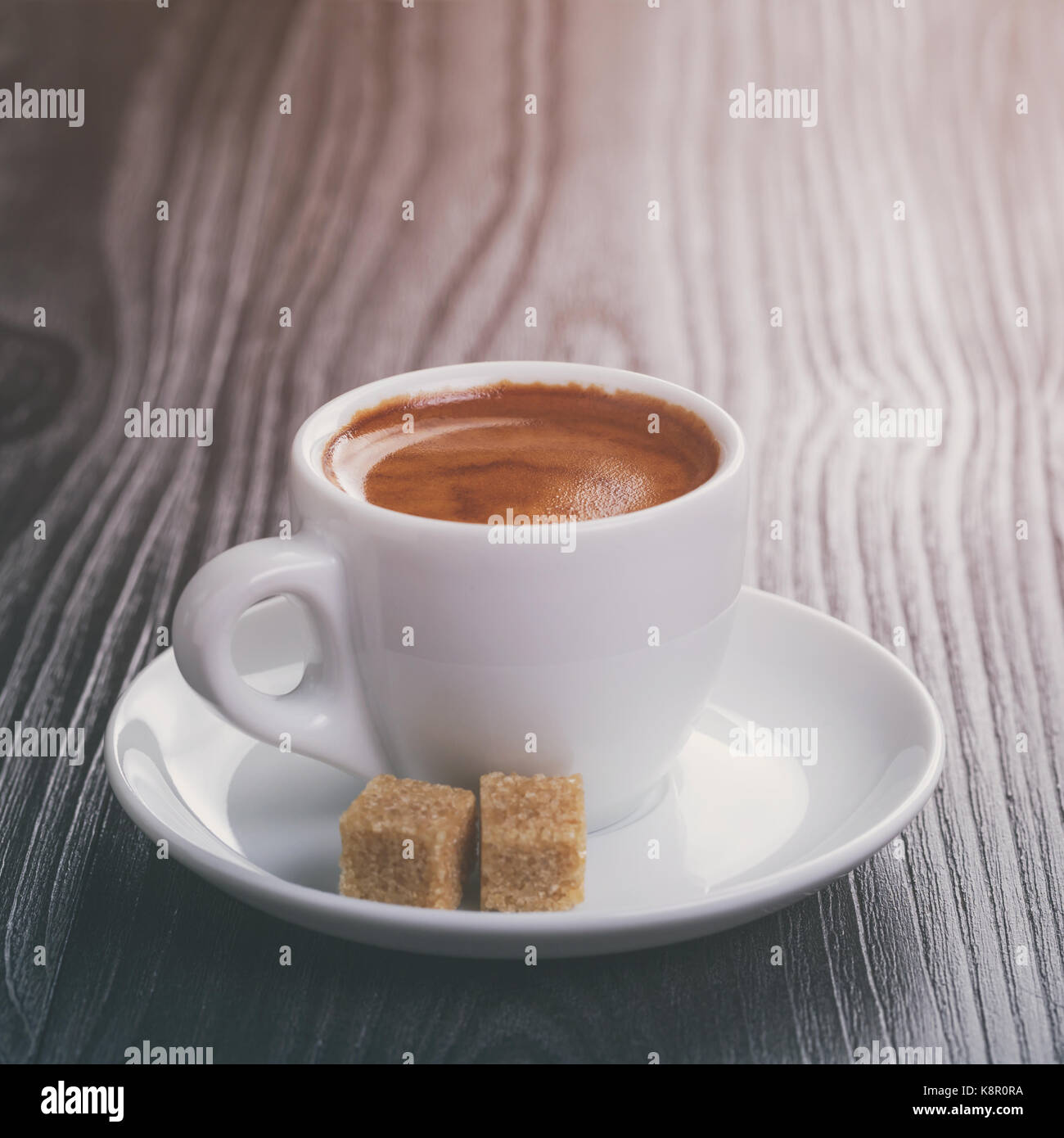 classic double espresso on wood table Stock Photo - Alamy
