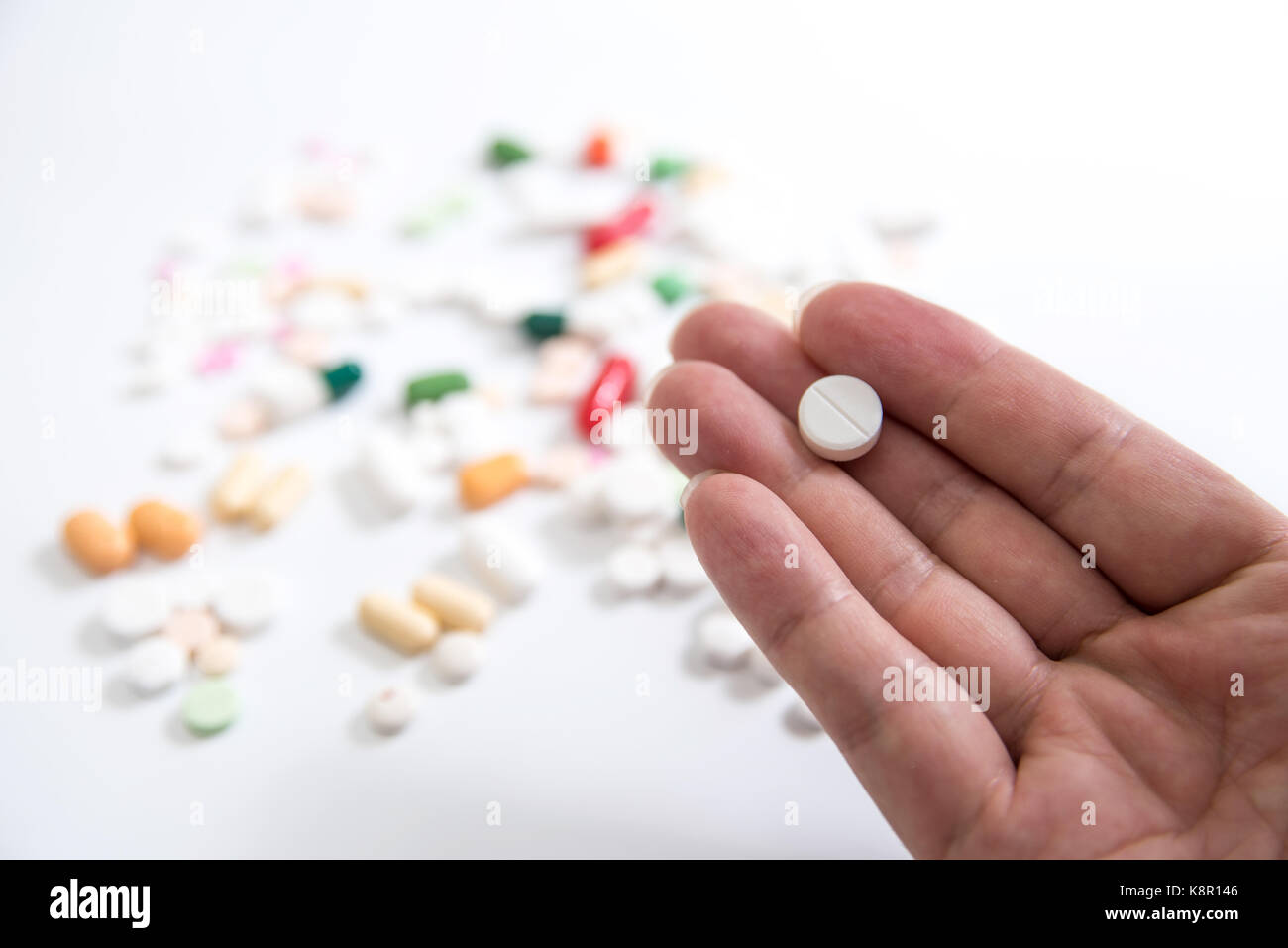 Human color pill hi-res stock photography and images - Alamy