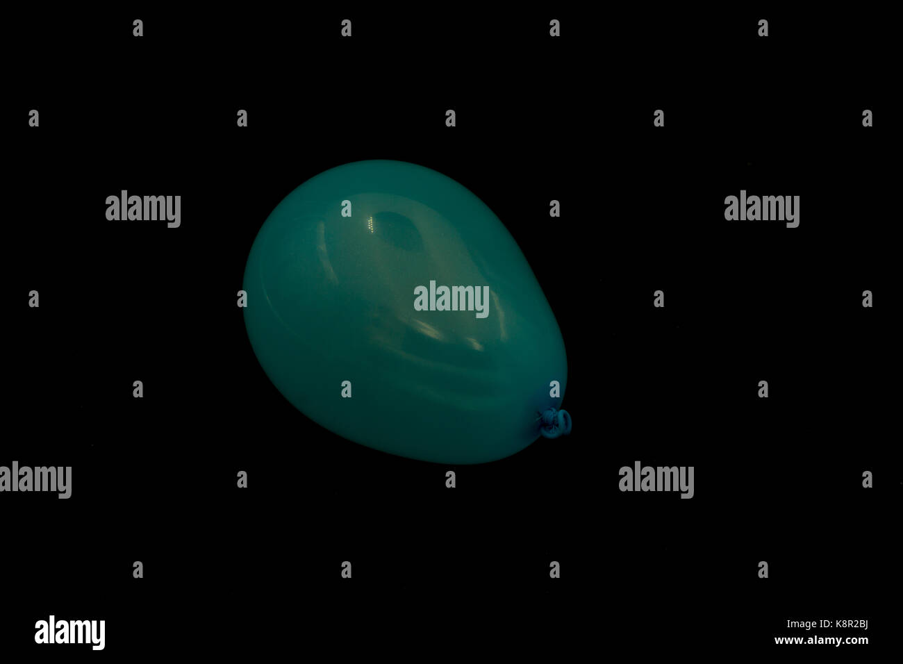 small Balloon on black background Stock Photo - Alamy