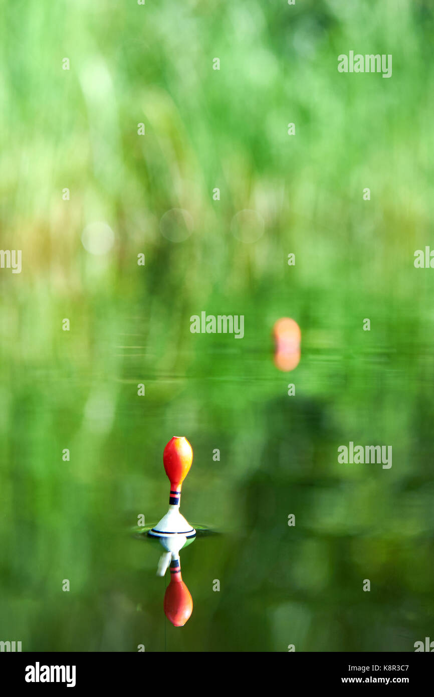 Fishing float on lake water hi-res stock photography and images - Alamy