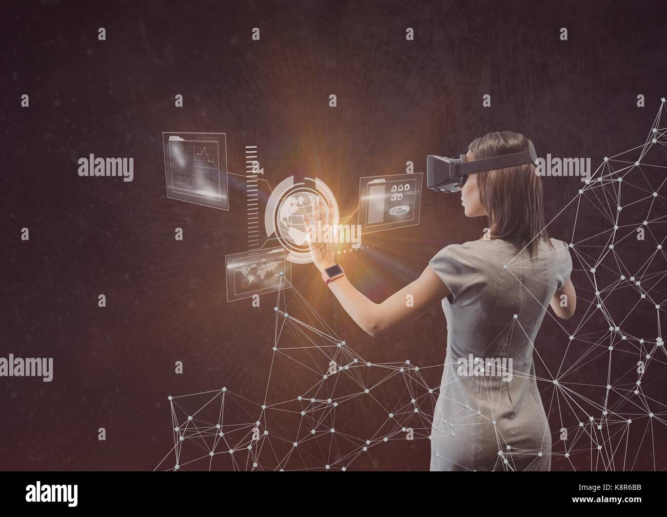Digital composite of woman in dress using vr headset Stock Photo - Alamy
