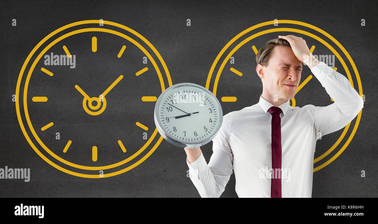 Digital composite of Worried business man holding a clock against ...