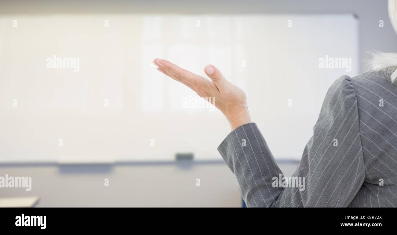 Digital composite of Womans open hand over whiteboard Stock Photo - Alamy