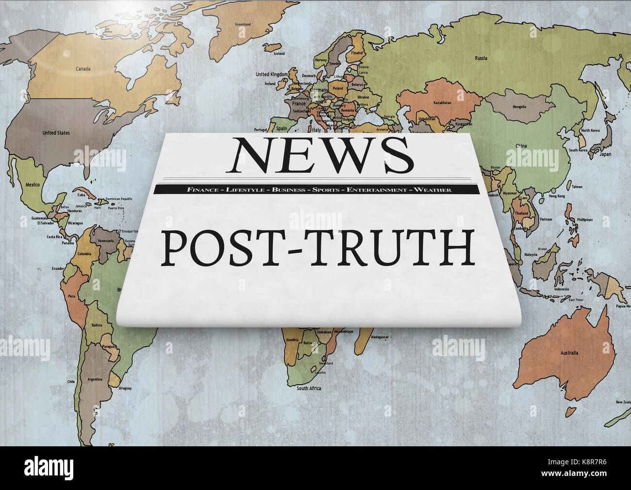 Digital composite of Post-truth text on newspaper over map of the world ...