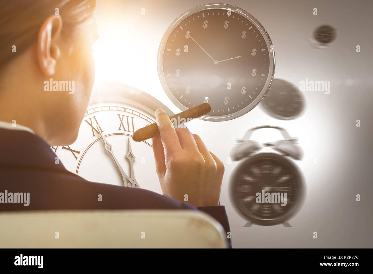 Businesswoman Holding Cigar Against Computer Generated Image Of Clocks