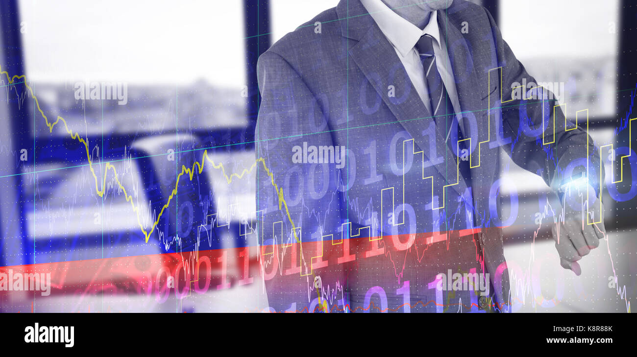 Mid section of businessman checking smart watch against stocks and ...