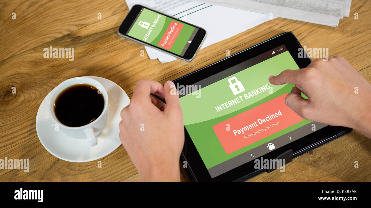 Internet banking text on mobile screen against cropped hands using ...