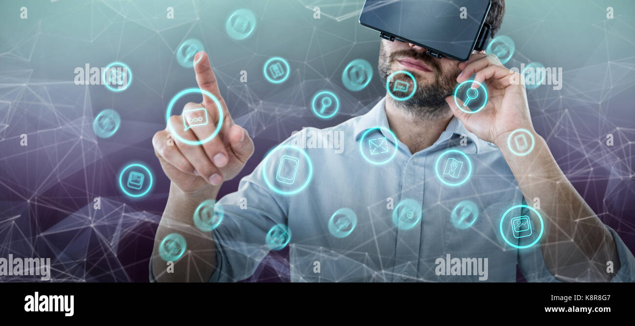 Man pointing while using oculus rift headset against purple and blue ...