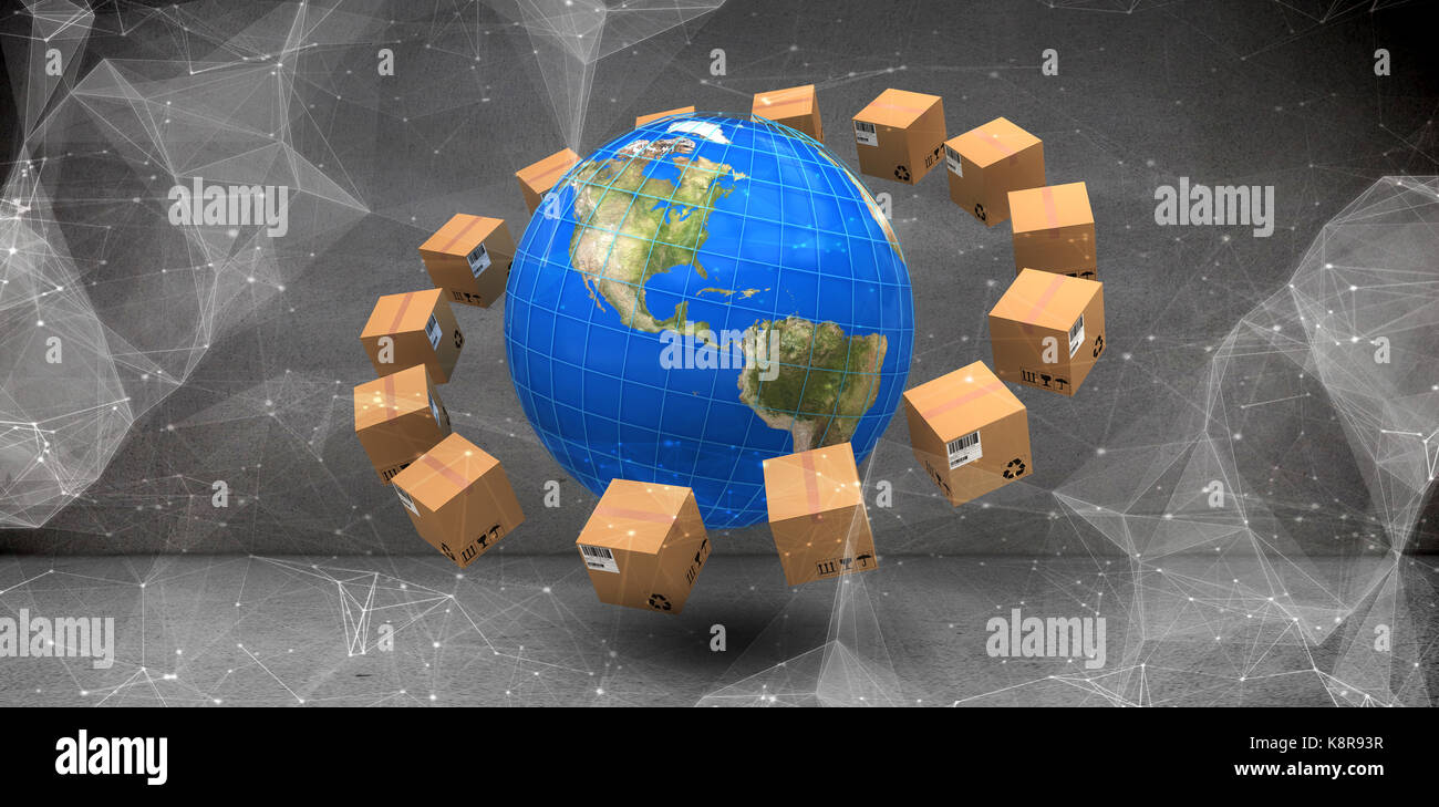 Globe amidst cardboard boxes against abstract black background Stock ...