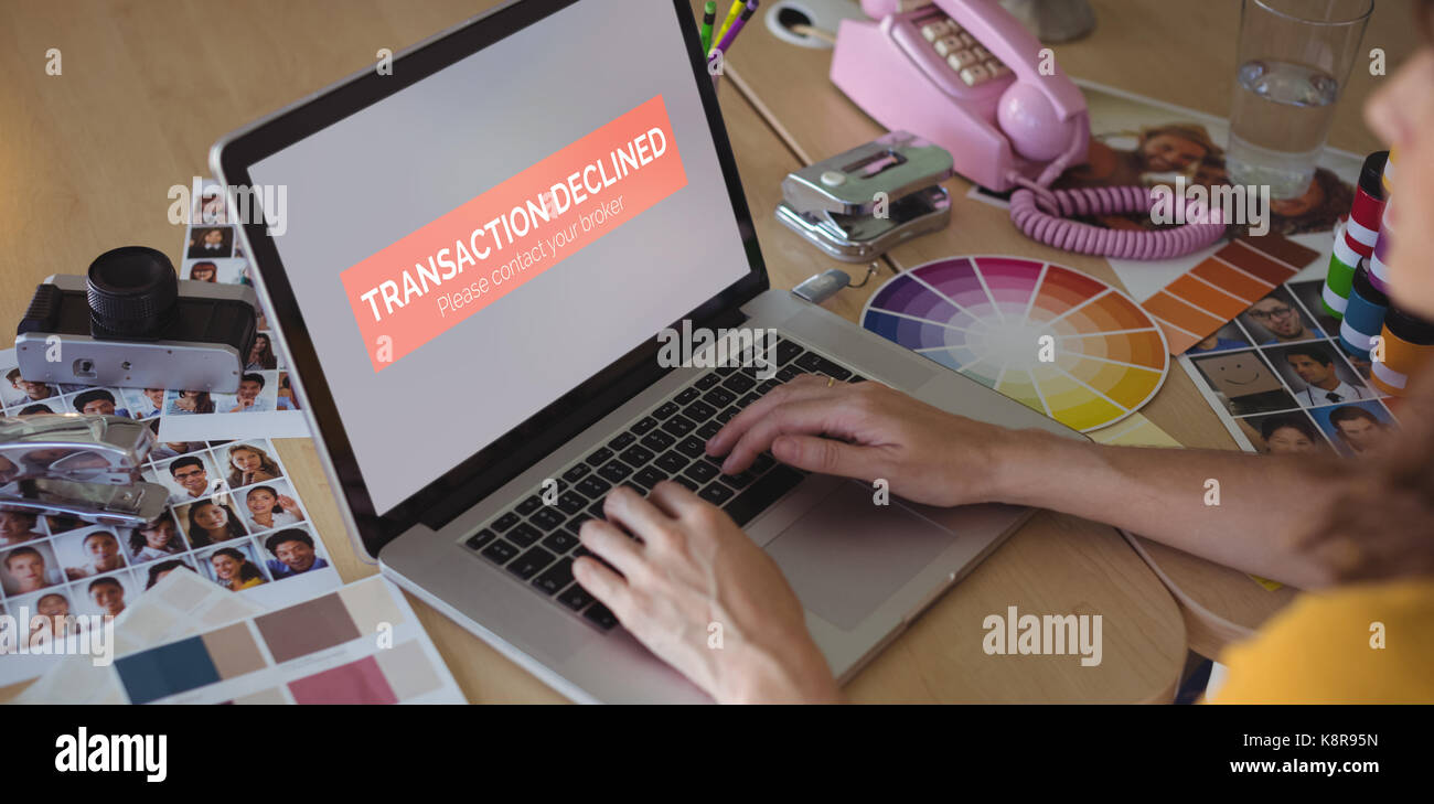 Transaction declined text on display against graphic designer working ...