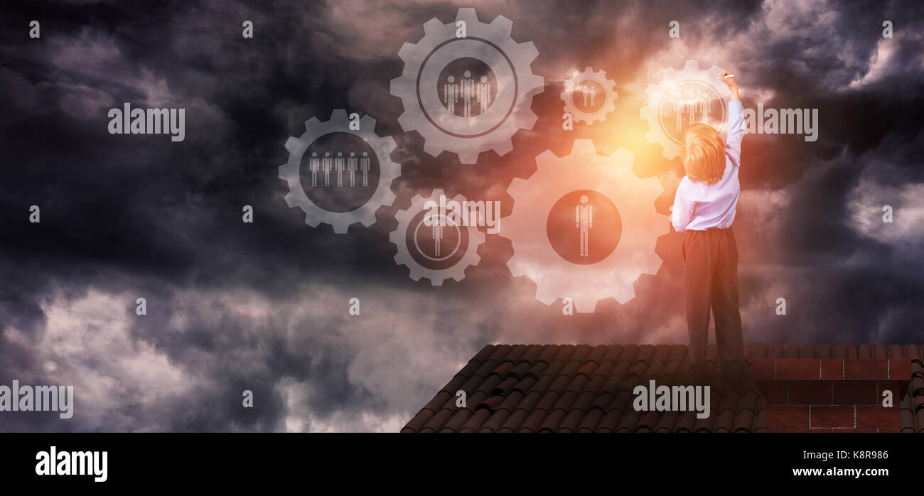 Cute pupil writing against gloomy sky Stock Photo - Alamy