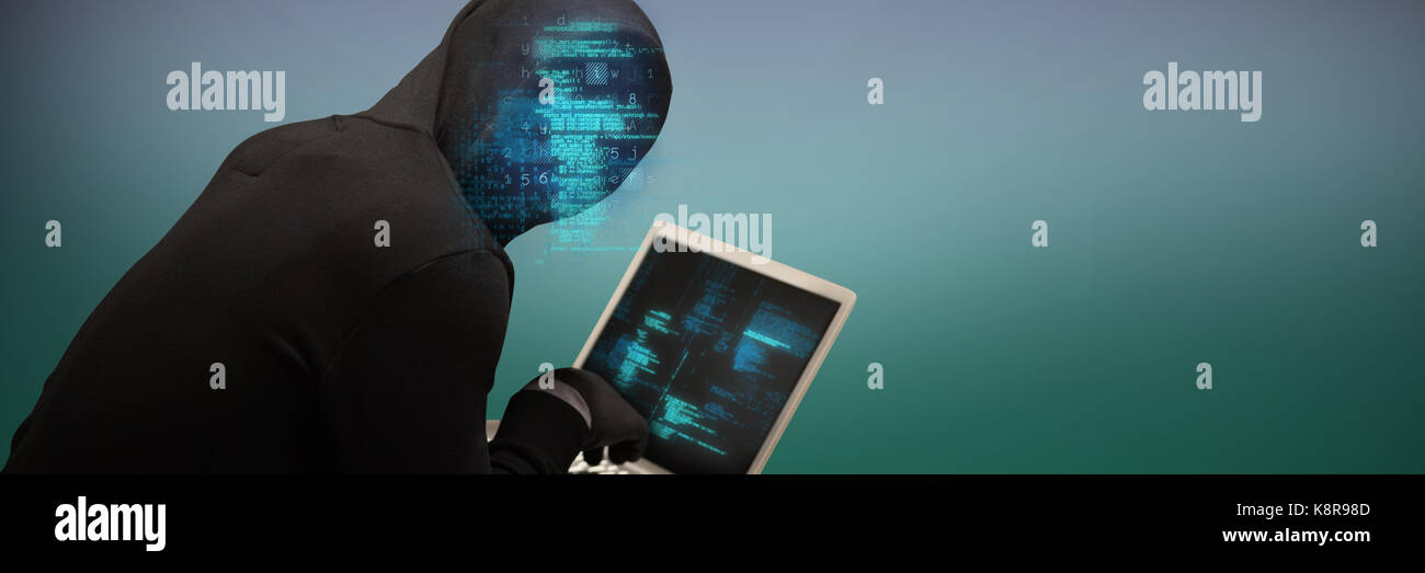 Hacker using laptop against turquoise and purple background Stock Photo ...