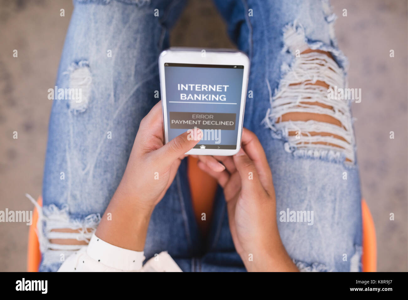 Internet banking text on mobile display against woman using phone Stock ...