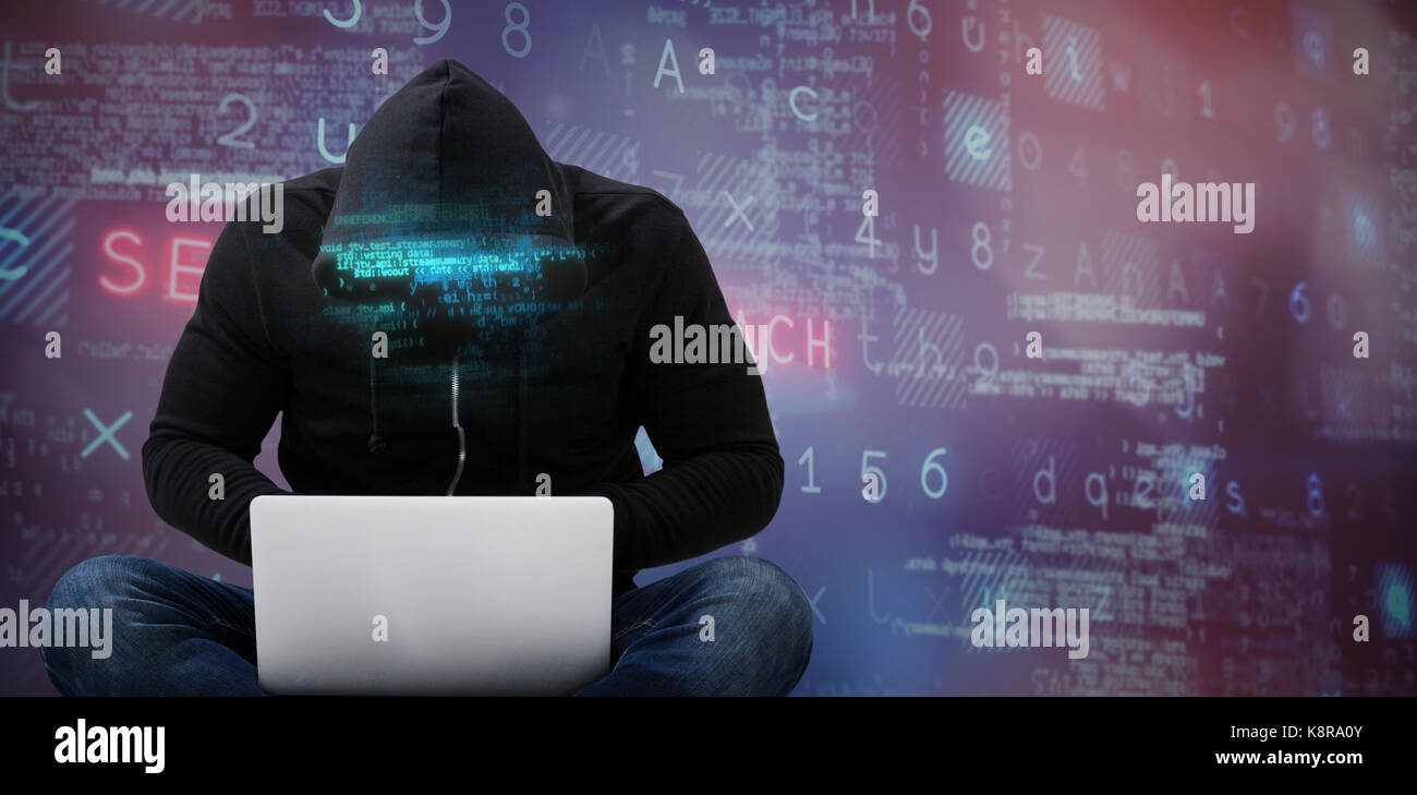Male hacker using laptop against purple and pink background Stock Photo ...