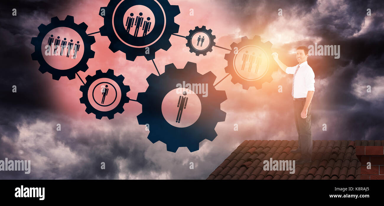 Business man writing with chalk against gloomy sky Stock Photo - Alamy