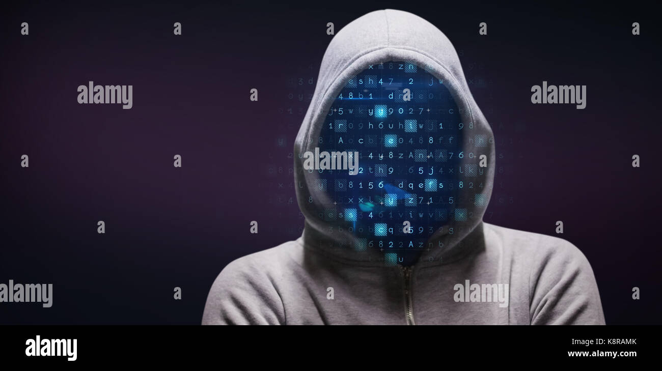 Hacker standing with arms crossed against purple and pink background ...