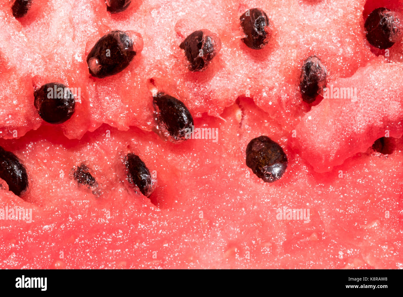 Close-up red fresh watermelon with black seeds. Healthy sweet tropical ...