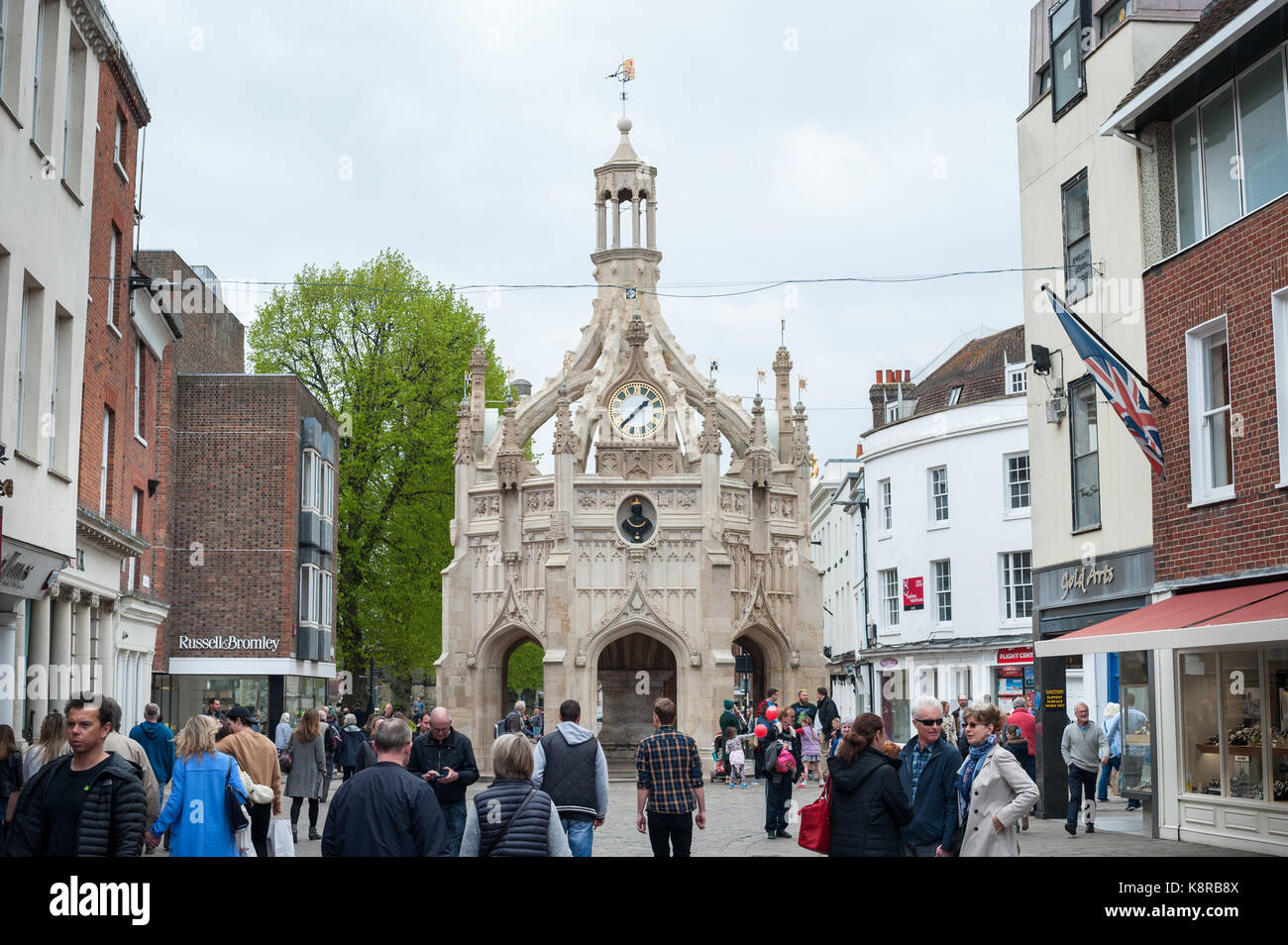 People walking along East Street and in front of the Market Cross in ...