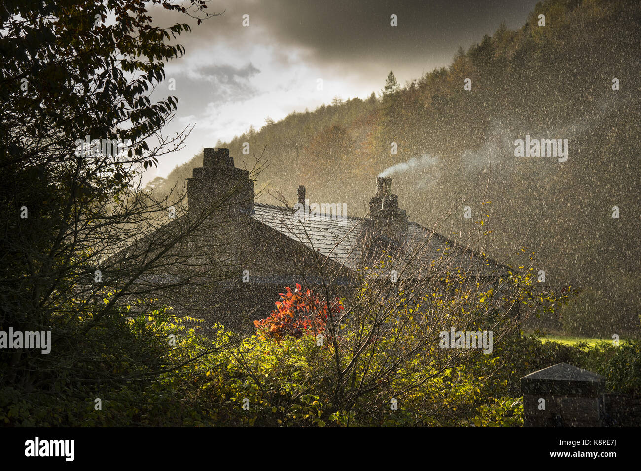 Heavy shower of rain with house at Whitewell, Clitheroe, Lancashire ...