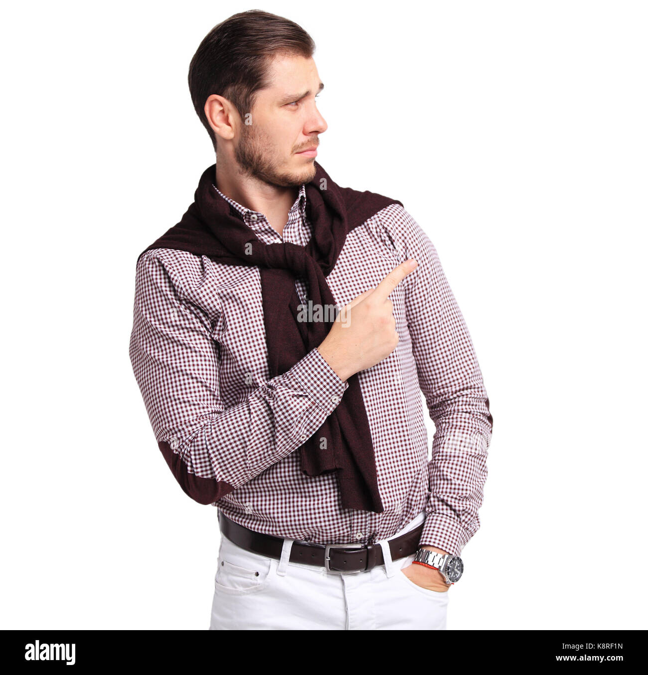 Happy smiling young man presenting and showing your text or product ... Happy smiling young man presenting and showing your text or product ...
