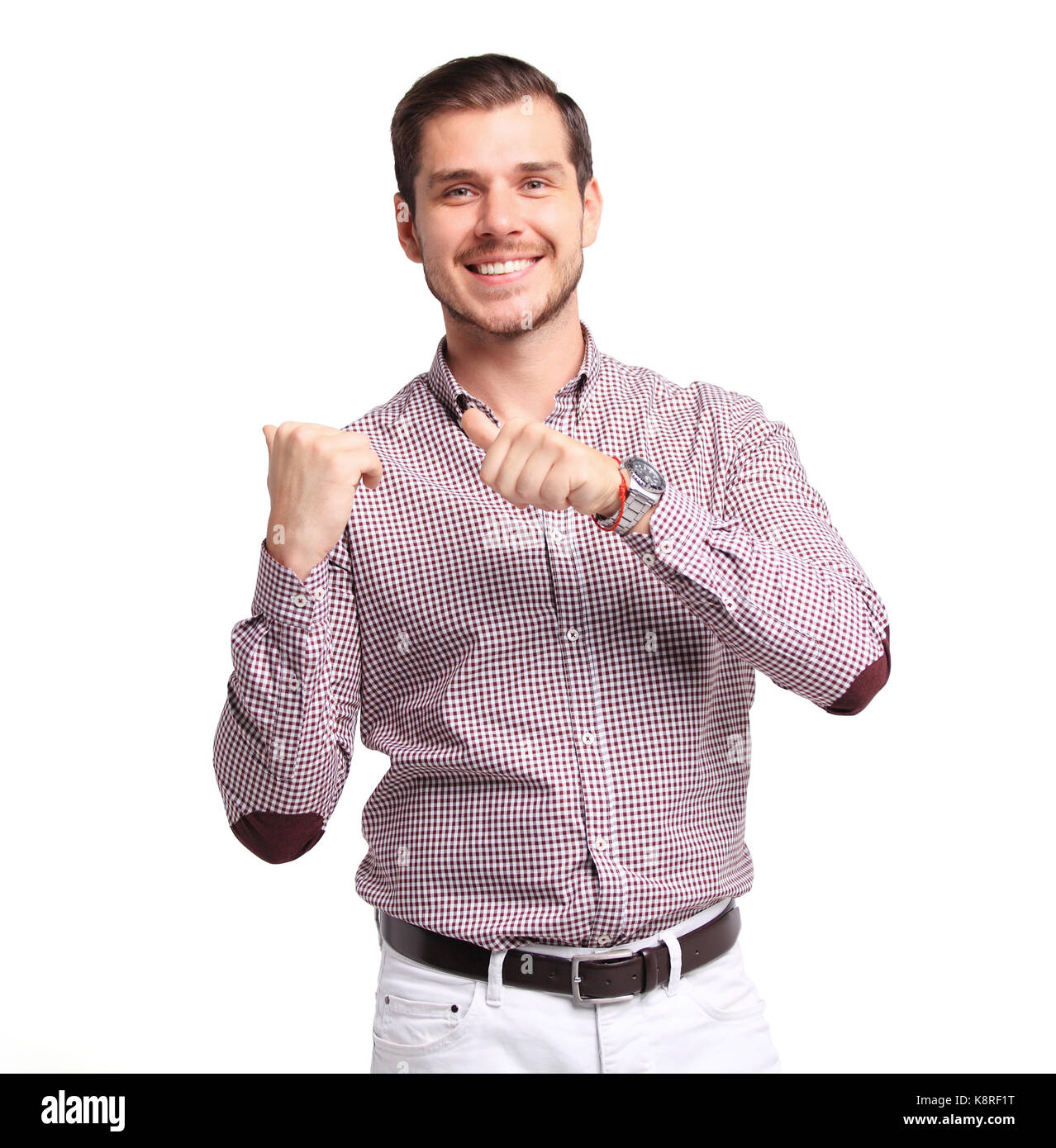 Happy smiling young man presenting and showing your text or product ...