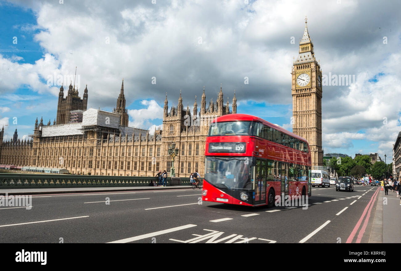 Red double-decker bus on the Westminster Bridge, Westminster Palace and ...
